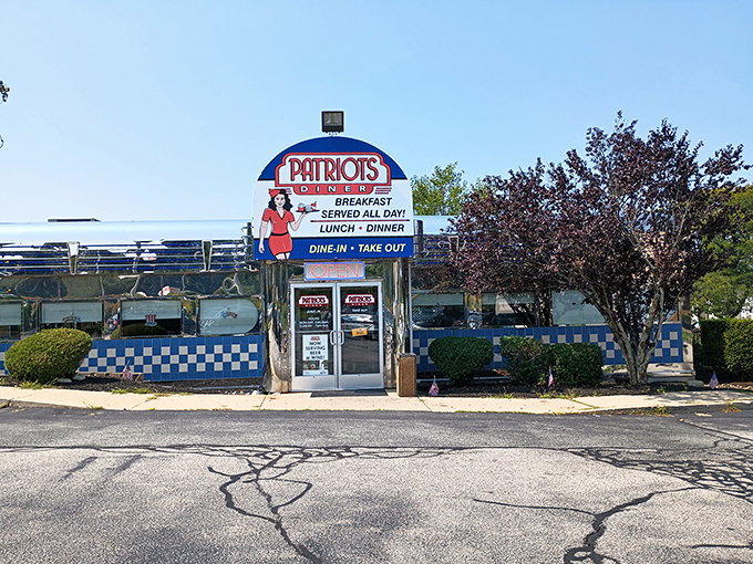 Patriots Diner gleams like a chrome time machine, promising comfort food that tastes exactly like your fondest childhood memories.