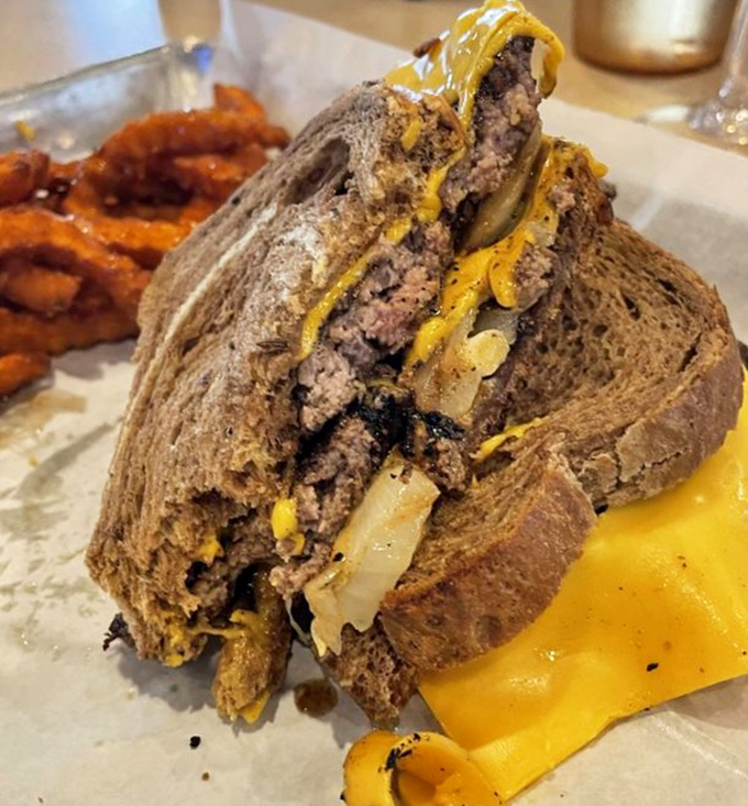 This isn't just a sandwich&mdash;it's architecture. Layers of beef, melted cheese, and grilled bread creating the skyscraper of satisfaction your lunch hour deserves.