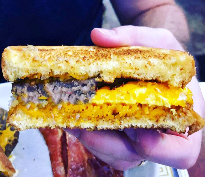 The patty melt: where burger meets grilled cheese in a beautiful union that would make cupid hang up his bow and just order lunch.