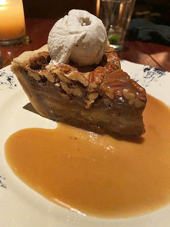 Pecan pie topped with ice cream and caramel&mdash;because sometimes restraint is overrated and happiness is mandatory.