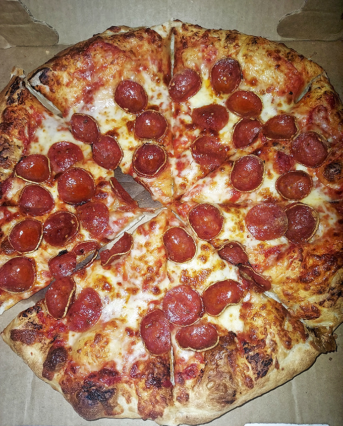 Some say perfection doesn't exist, but they haven't met this pepperoni pizza. The crispy-chewy crust and generous toppings make a compelling counterargument.