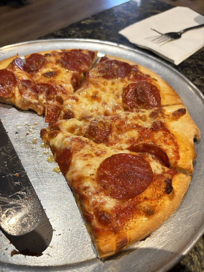 Sometimes perfection is simple: a classic pepperoni pizza with that ideal ratio of crisp crust, tangy sauce, and cheese that stretches for days.