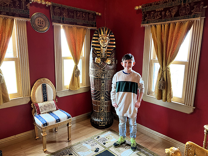 Step into ancient Egypt without the airfare &ndash; vibrant red walls and golden accents create a royal chamber worthy of Cleopatra herself.