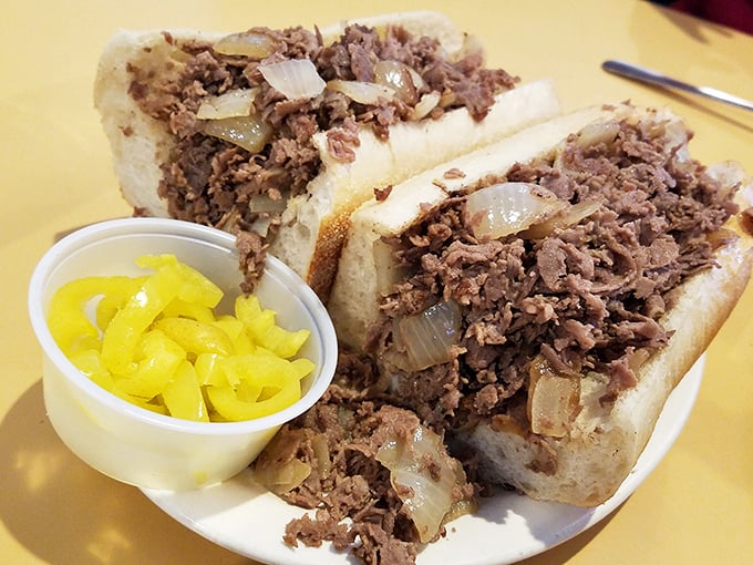 Philly's iconic sandwich done right&mdash;tender beef, caramelized onions, and those banana peppers adding the perfect tang. A handheld masterpiece worth the napkins.