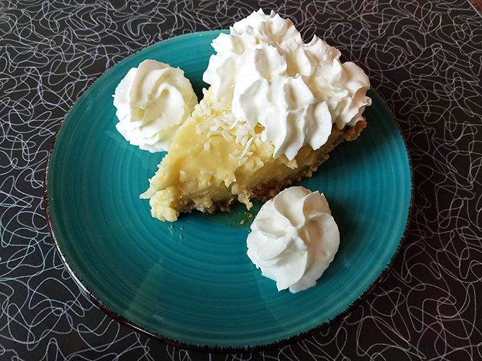 Coconut cream pie that would make your grandmother both proud and jealous. That whipped cream isn't just a topping &ndash; it's a crown.
