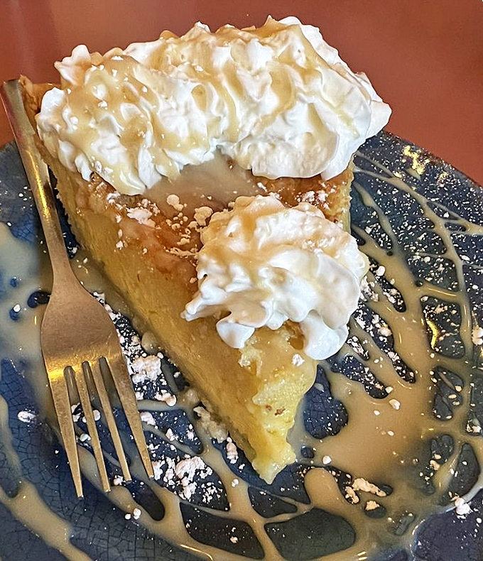 Pie that deserves its own Instagram account. The whipped cream isn't from a can, and the caramel drizzle isn't apologizing for anything.