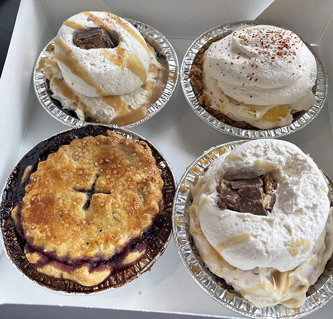 The "Quad" option solves life's greatest dilemma: which pie to choose. Like the United Nations of desserts, four distinct pie nations coexisting in delicious harmony.