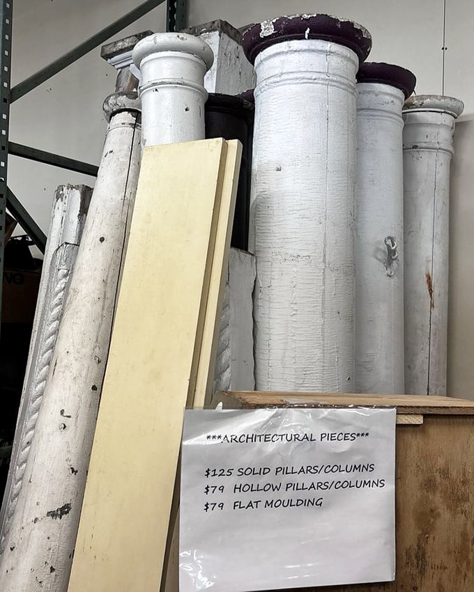 Architectural columns that once supported grand buildings now wait for their second act. History by the foot, ready for reimagining.