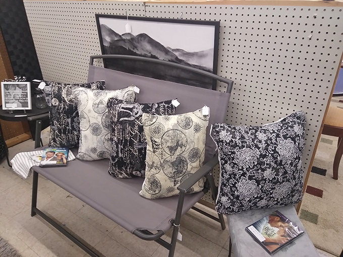 A modern bench gets the royal treatment with patterned pillows fit for a design magazine spread. Proof that secondhand doesn't mean second-rate style.