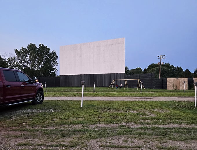 Between films, kids burn off energy at the playground while parents stretch their legs, a perfect intermission ritual as old as drive-ins themselves.