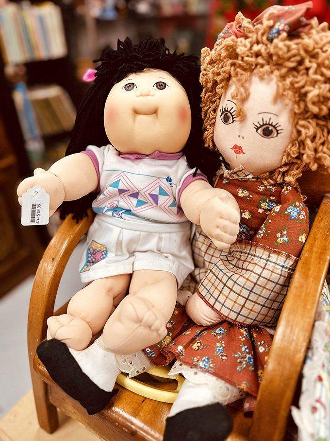 Cabbage Patch Kid meets handcrafted doll in this charming display that triggers waves of nostalgia for anyone who grew up in the '80s.