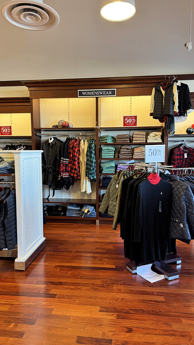 The 50% off signs are the retail equivalent of a siren song. Ralph Lauren's preppy paradise beckons with promises of country club style for bowling alley prices.
