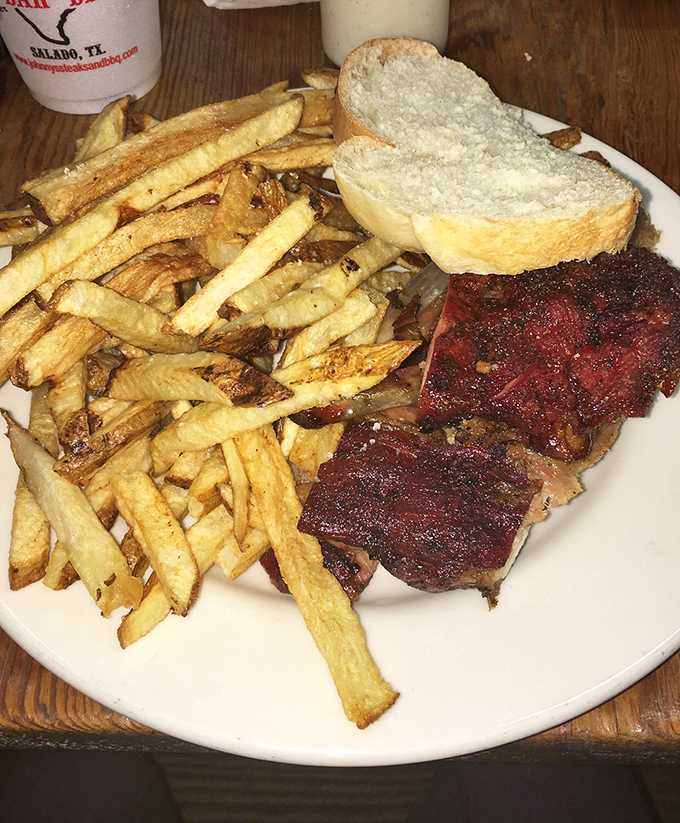 When fries outnumber the ribs on your plate, you know you're in a place that understands Texan portion philosophy.