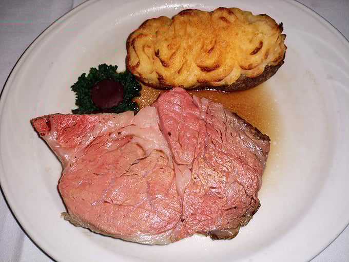 Prime rib so perfectly pink it blushes when you look at it, accompanied by a duchess potato that's having a better hair day than most of us.
