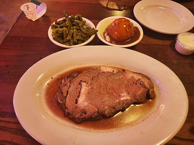 The prime rib in all its glory&mdash;tender, perfectly pink, and served with sides that know their supporting role but still deserve a standing ovation.