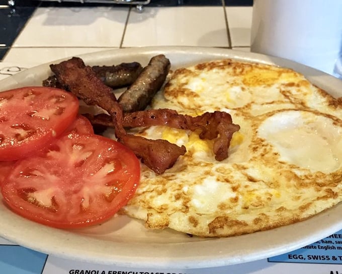 The protein platter that answers the eternal question: "Why choose between bacon, sausage and eggs when you can have it all?" Morning ambition on a plate.