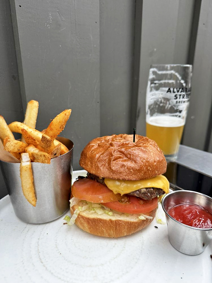 A burger that requires both hands and a strategy. That brioche bun, melty cheese, and perfectly cooked patty create the trifecta of burger perfection.