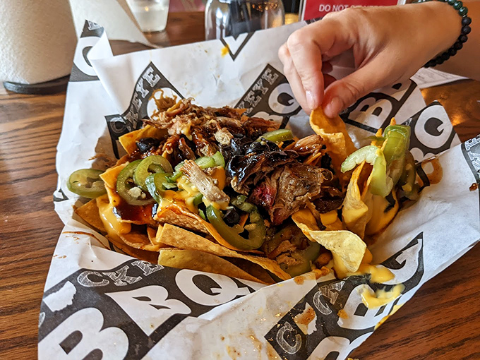 Nachos topped with pulled pork and jalape&ntilde;os transform snack food into a legitimate meal worth celebrating with enthusiasm.