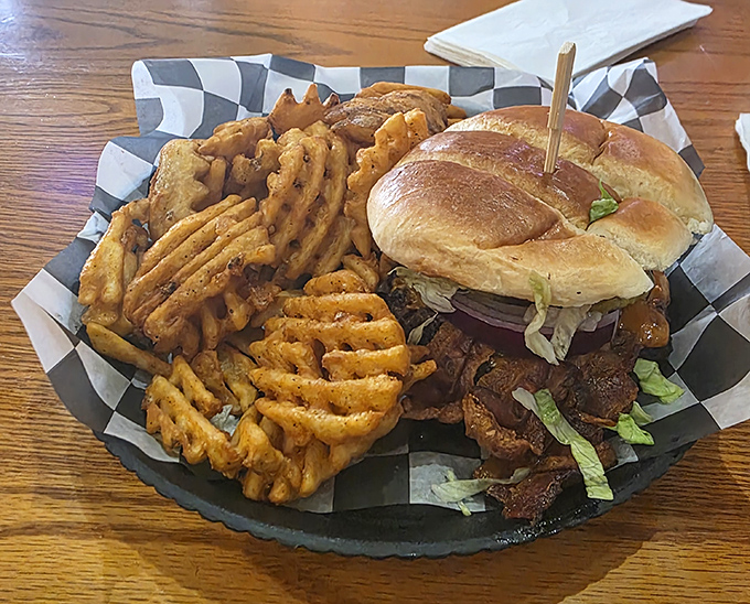 Waffle fries and a pulled pork sandwich join forces on this checkered paper &ndash; a partnership so perfect it deserves its own buddy comedy.