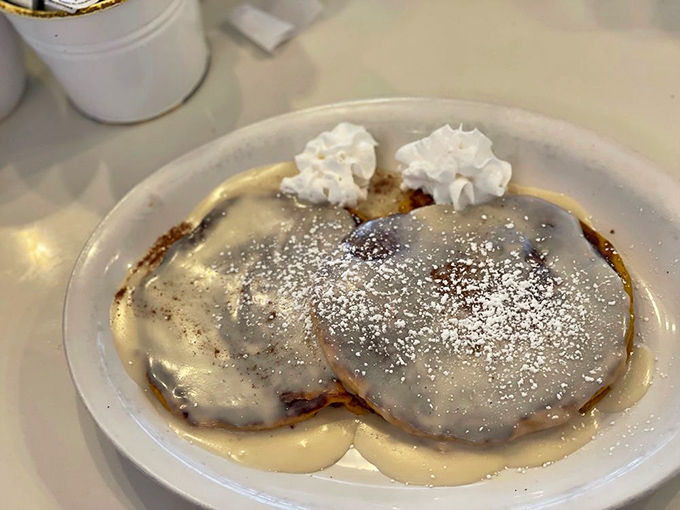 Whoever said "you can't have dessert for breakfast" clearly never encountered these cloud-like creations swimming in buttery sauce and topped with fresh fruit.
