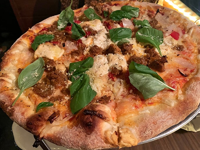 This isn't just pizza &ndash; it's edible Philadelphia history. Fresh basil leaves add a touch of garden brightness to this rustic pie.