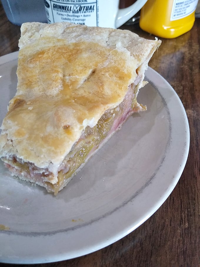 This slice of rhubarb pie, with its perfect balance of tart and sweet, is the edible equivalent of finding money in an old jacket.