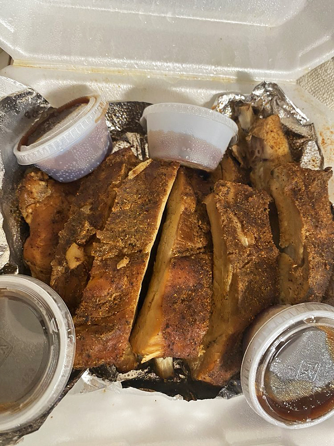 These ribs don't need fancy presentation&mdash;they've got that deep amber color that whispers, "I've been smoked with patience and expertise."