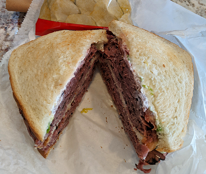 A roast beef sandwich so packed with meat it could make a vegetarian weep. The kind of sandwich that requires both hands and your complete attention.