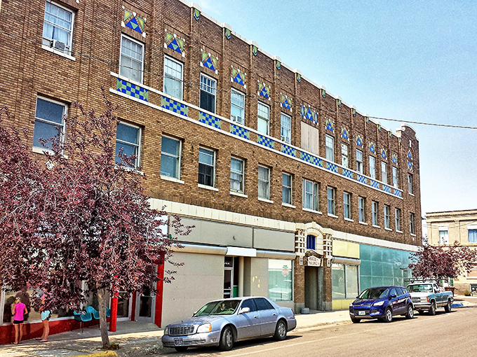 The Rundle Building's decorative brickwork and blue accents showcase the architectural pride of Glasgow's historic downtown district.