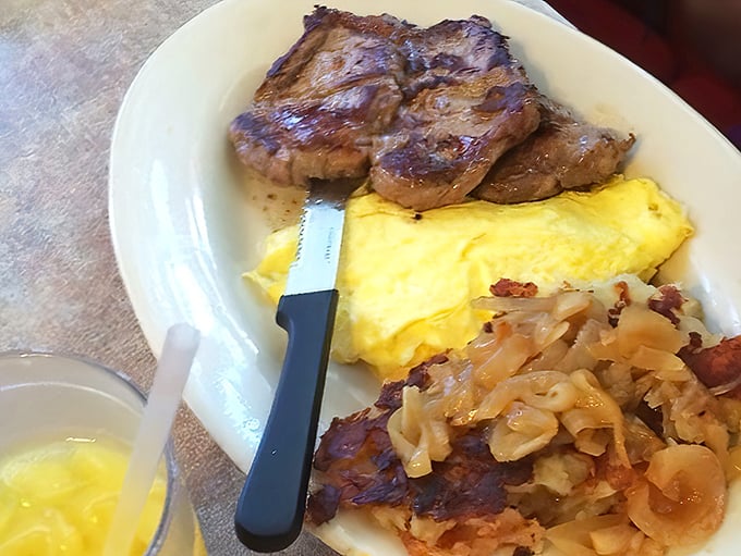 Steak and eggs—the power couple of diner breakfasts—served with a side of hash browns that have achieved the perfect crisp-to-tender ratio.