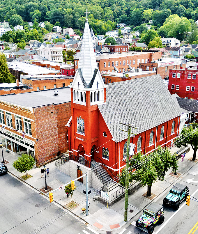 Saint Patrick Catholic Church's striking red brick and soaring steeple make it the architectural equivalent of raising your hand in a crowd saying, "I'm here!"