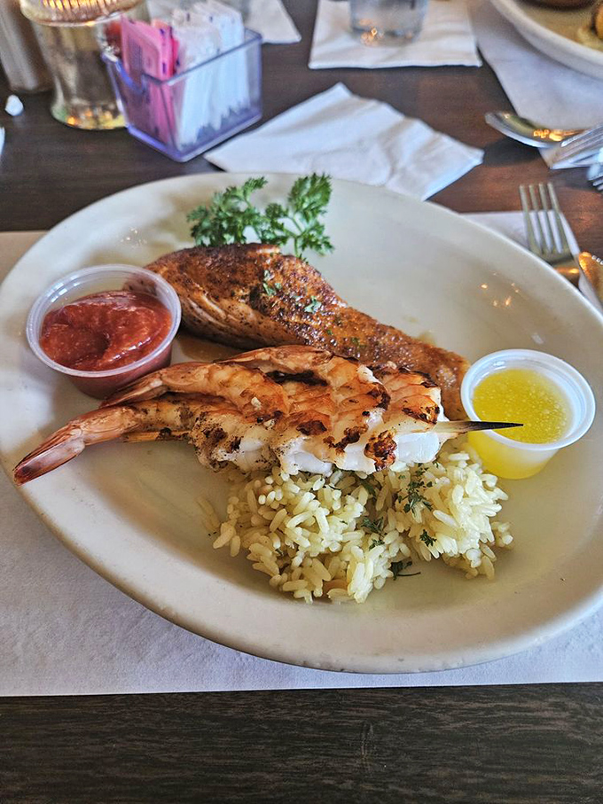 When salmon meets shrimp on a plate with rice, it's not just a meal &ndash; it's a seafood summit with delicious diplomatic relations.