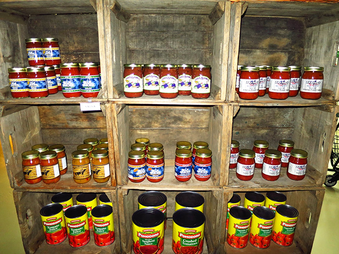 Mason jar magic! These rustic wooden shelves showcase homemade salsas and sauces that hold the secret to turning Tuesday night dinner into something worth talking about.