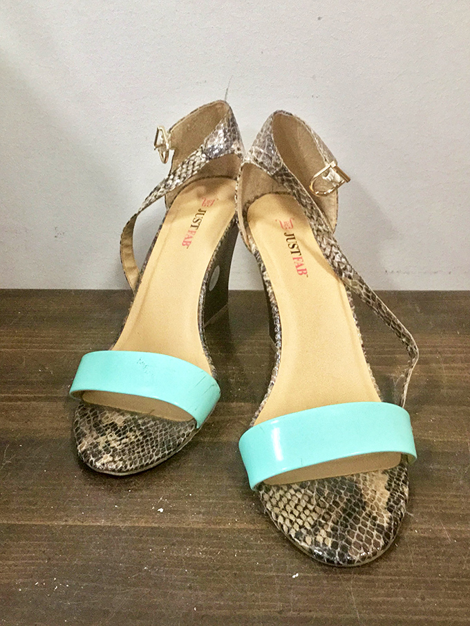 Snake print meets turquoise in these stylish sandals&mdash;proof that secondhand doesn't mean second-rate in the fashion department.