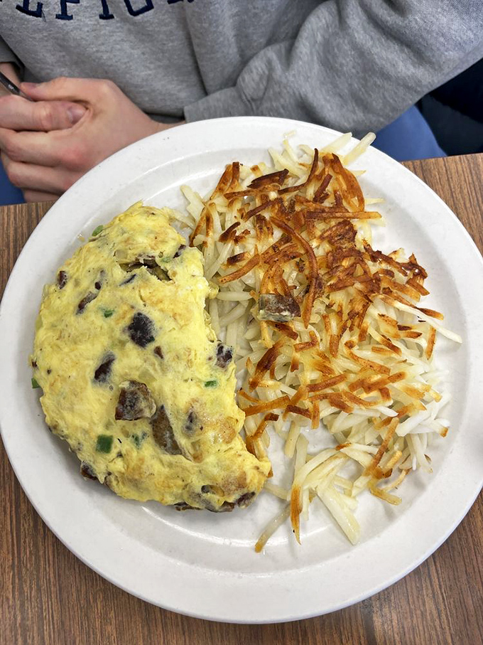 This omelet and hash browns combo isn't just breakfast&mdash;it's edible sunshine on a plate, ready to brighten even the cloudiest Ohio morning.