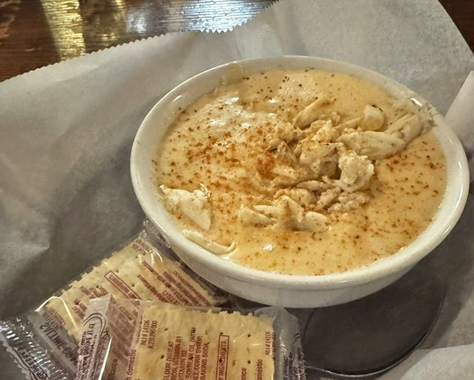 She-crab soup: where cream and crab perform a slow dance in a bowl. This velvety concoction might just be what mermaids serve at their dinner parties.