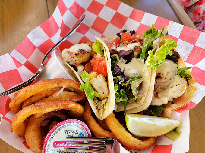 Tacos that make you reconsider your life choices. Why haven't you been eating seafood tacos every day? The crisp vegetables provide the perfect counterpoint.