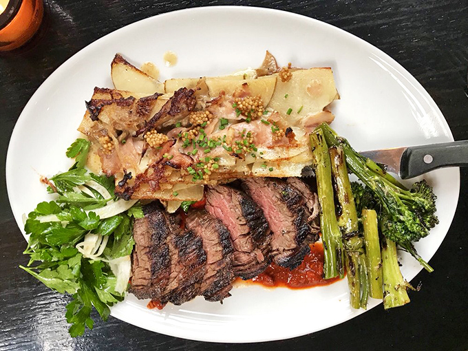 A carnivore's delight that proves simplicity done right is unbeatable. Perfectly grilled steak with roasted vegetables and that vibrant chimichurri sauce steals the show.