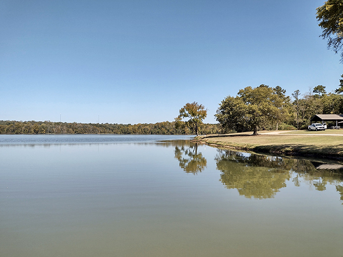 Sloss Lake creates mirror images of Alabama's blue skies, offering fishermen and daydreamers equal opportunity for peaceful contemplation.