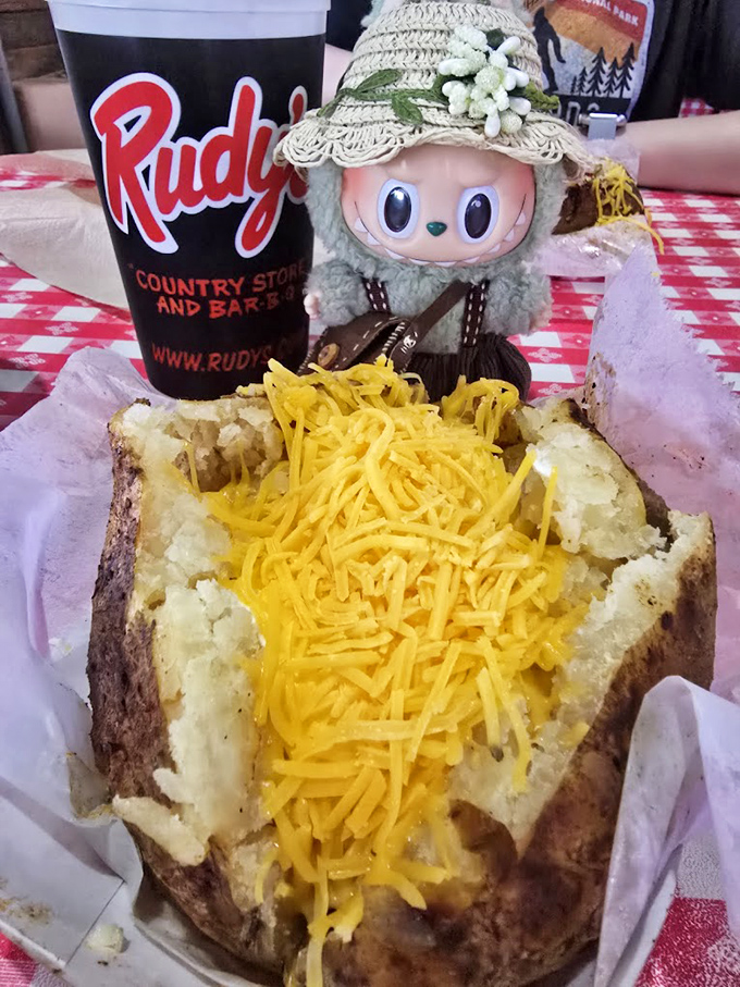 The legendary smoked potato, topped with a sunshine shower of cheese &ndash; comfort food that makes mashed potatoes seem like they're not even trying.