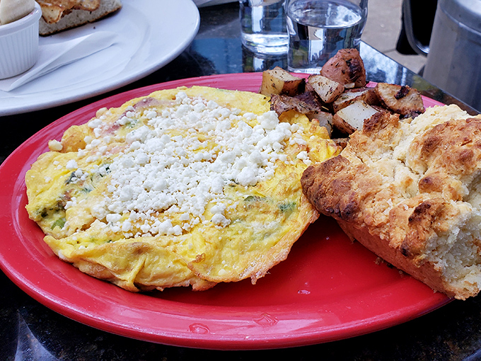 This frittata and biscuit combo is the breakfast equivalent of finding front-row concert tickets in your coat pocket. Unexpected joy on a red plate.