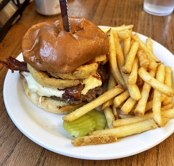 This isn't just a burger, it's a towering achievement&mdash;bacon, egg, and cheese conspiring to create the ultimate comfort food rebellion.