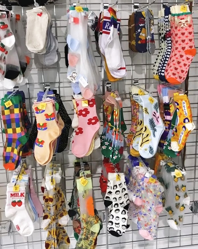 The sock wall of dreams &ndash; where patterns collide like a kaleidoscope had a party with your feet.