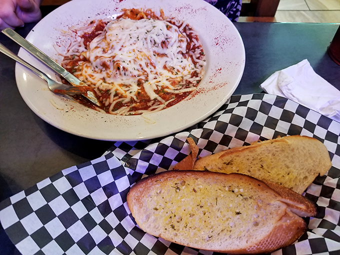 Spaghetti and meatballs with garlic bread reminds you why Italian-American comfort food conquered the world so completely.