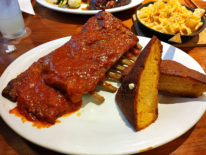 Ribs so tender they practically surrender to your fork, glazed with a sauce that strikes the perfect balance between sweet and heat.