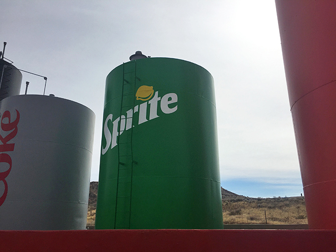 The Sprite can's meticulous detailing, complete with lemon-lime logo, shows surprising artistic commitment to this quirky roadside vision.