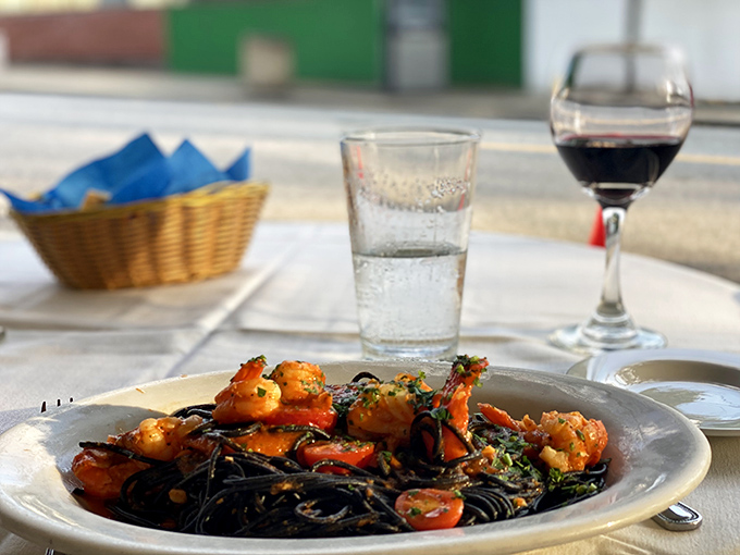 Black squid ink pasta with shrimp and cherry tomatoes – dramatic as an Italian opera and twice as satisfying.