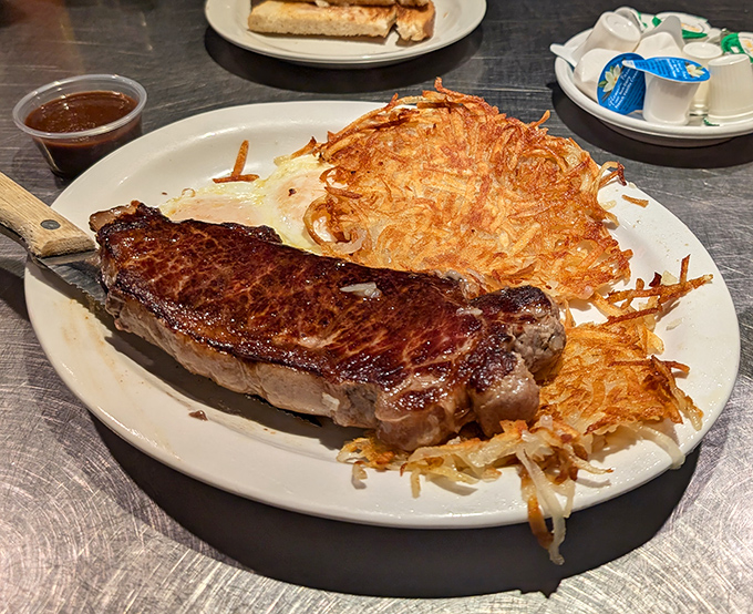 This steak doesn't need a fancy steakhouse setting to shine&mdash;just a skilled grill master and a mountain of crispy hash browns as its sidekick.