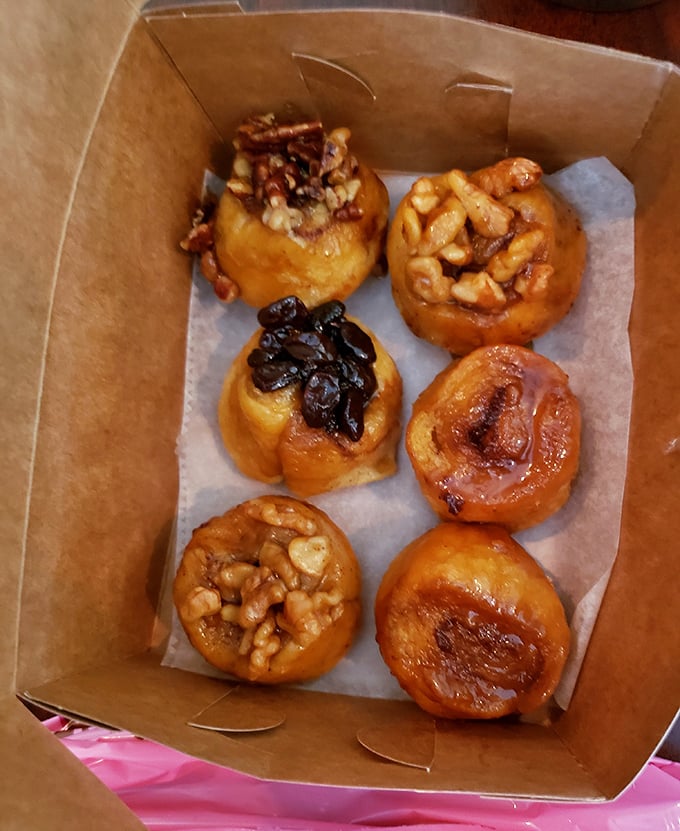 Sticky buns that glisten with caramel promise&mdash;each one a spiral journey to the sweet center of the universe.