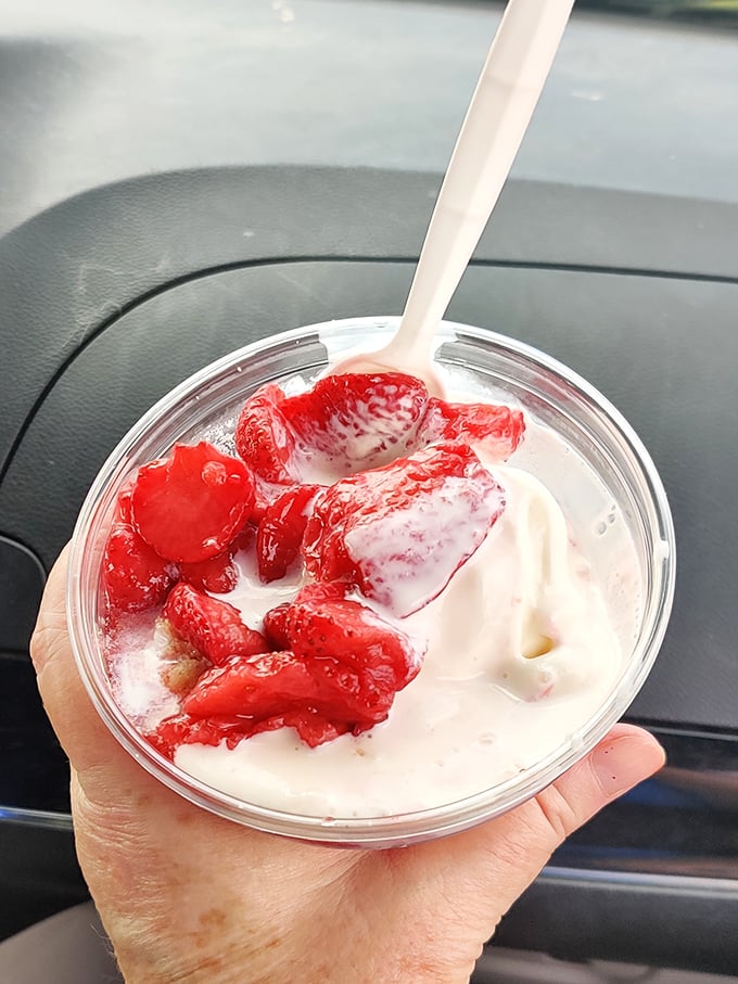 Fresh strawberries swimming in vanilla custard&mdash;nature's candy meeting dairy perfection in a summer romance that never goes out of style.